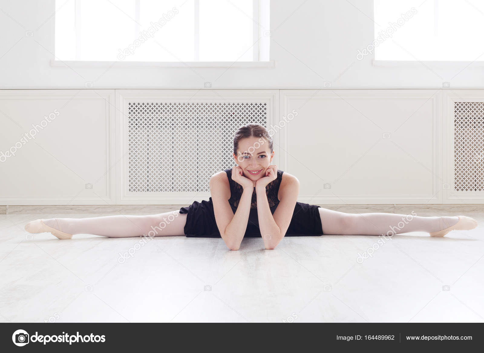 Classical ballet dancer portrait in white dansing hall Stock Photo by ...