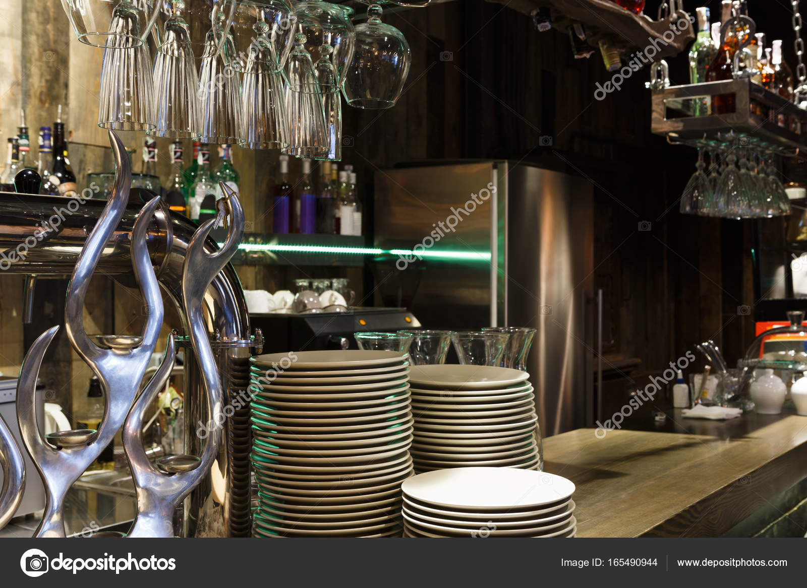 Bar counter with clean dishes close up Stock Photo by ©Milkos 165490944