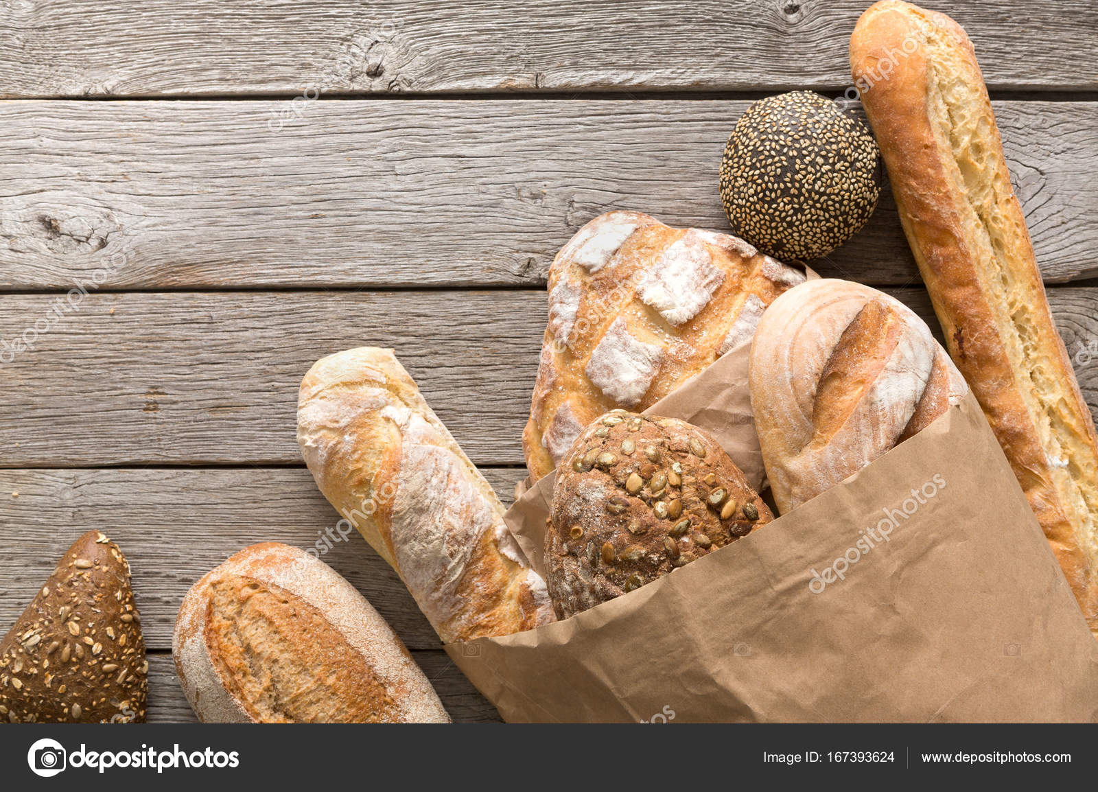 Bread bakery background. Brown and white wheat grain loaves comp ...