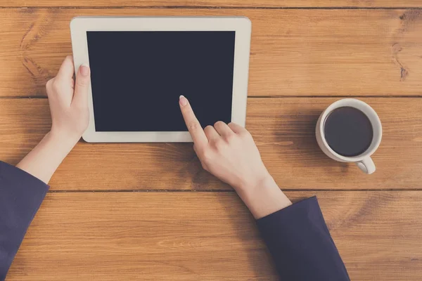 Women hands with tablet computer and coffee on table — Stock Photo ...
