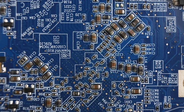 Laptop motherboard microcircuit closeup Stock Photo by ©Milkos 160581410