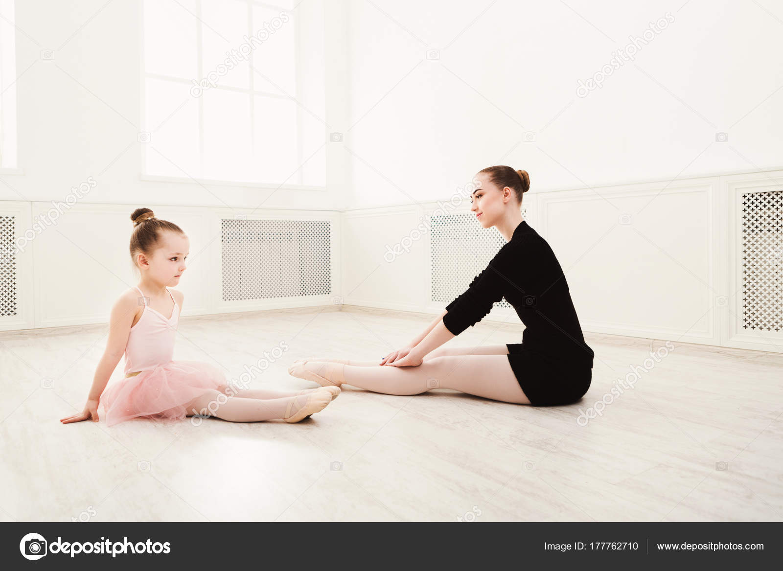 Little girl learn ballet with teacher copy space Stock Photo by ©Milkos ...