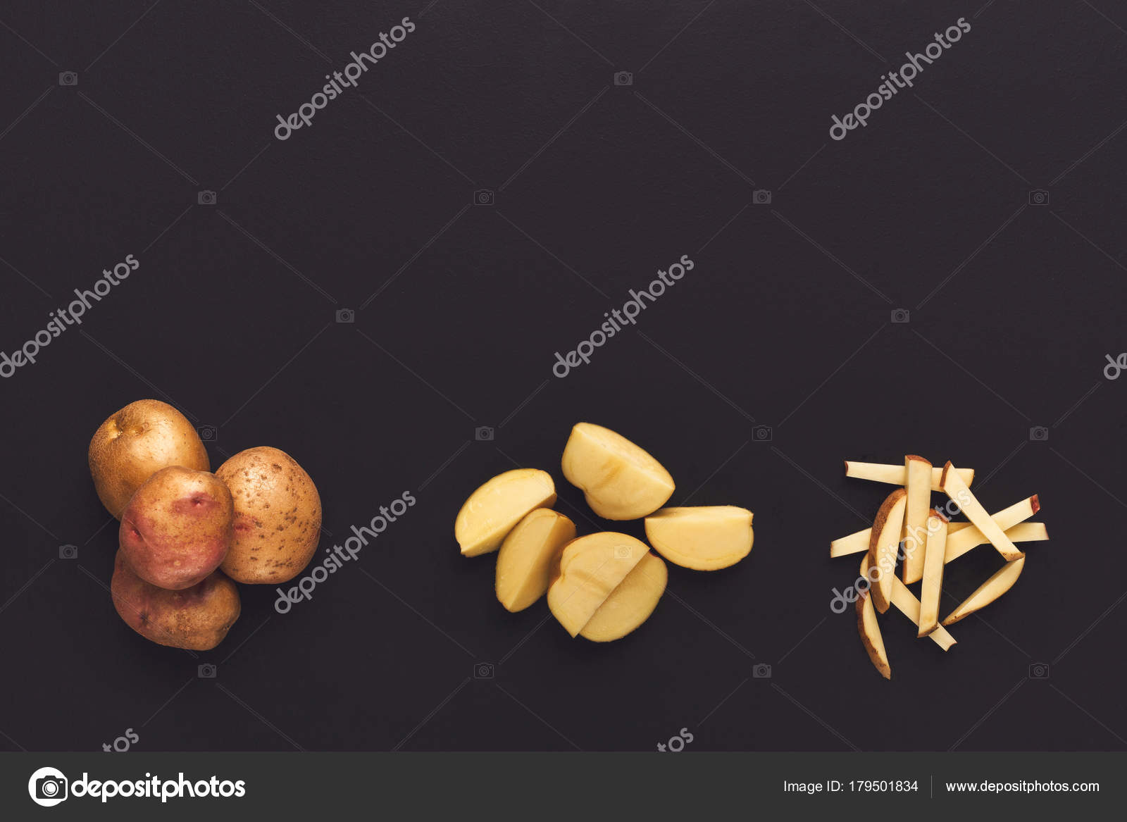 Whole and cut potato on black isolated background Stock Photo by ...