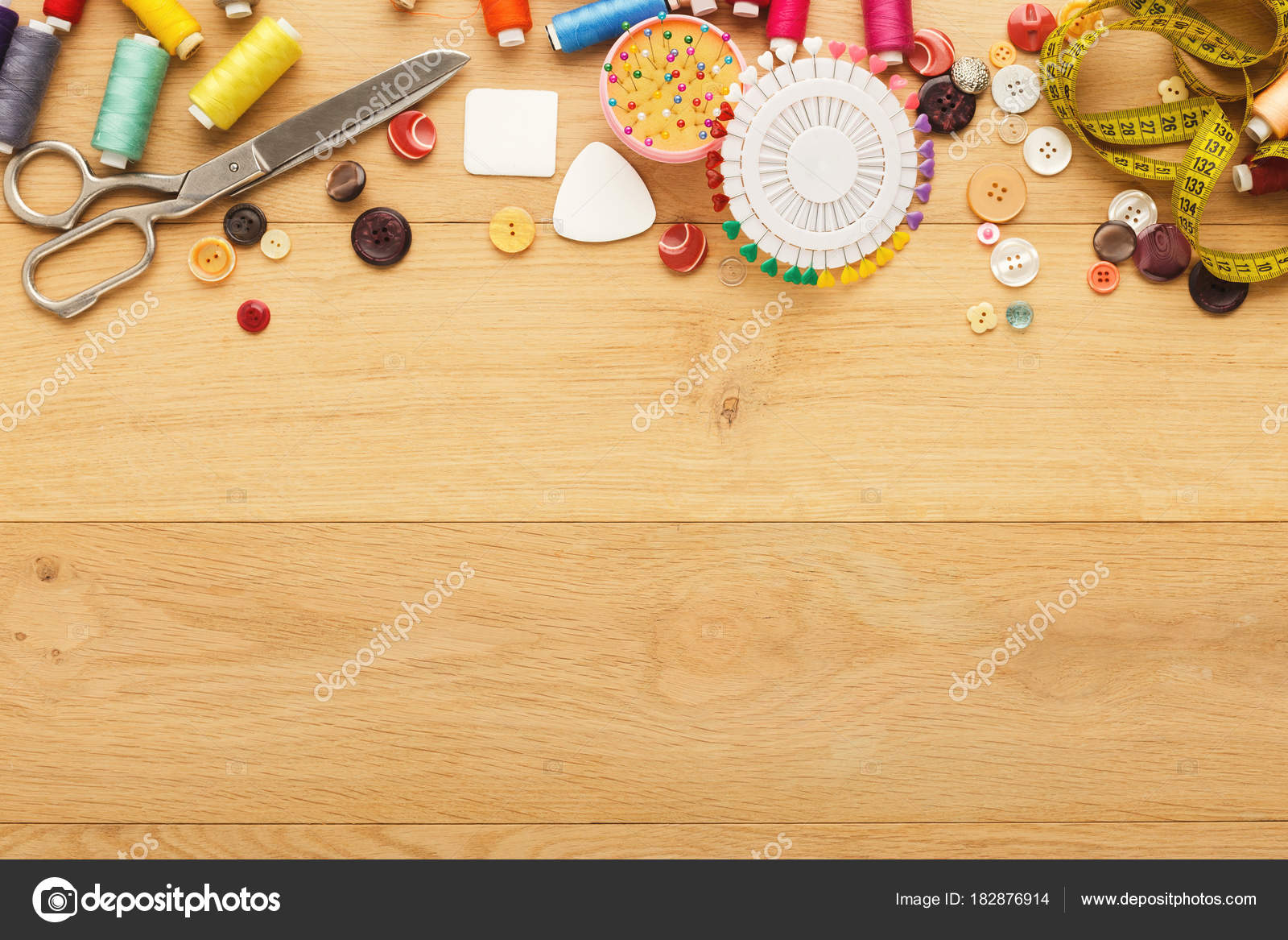 Collection of threads and buttons on wooden table background Stock ...
