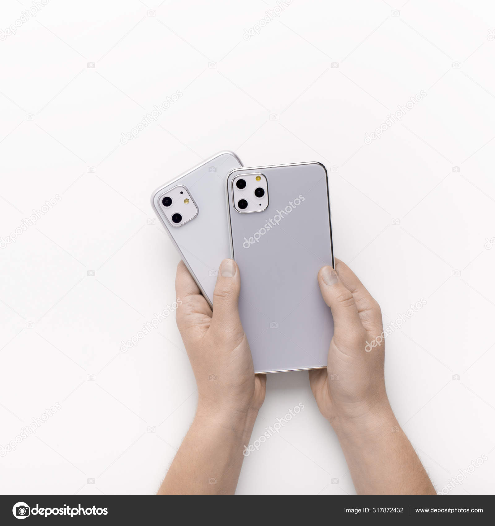 Customer holding Two new iPhones 11 with different cameras – Stock ...