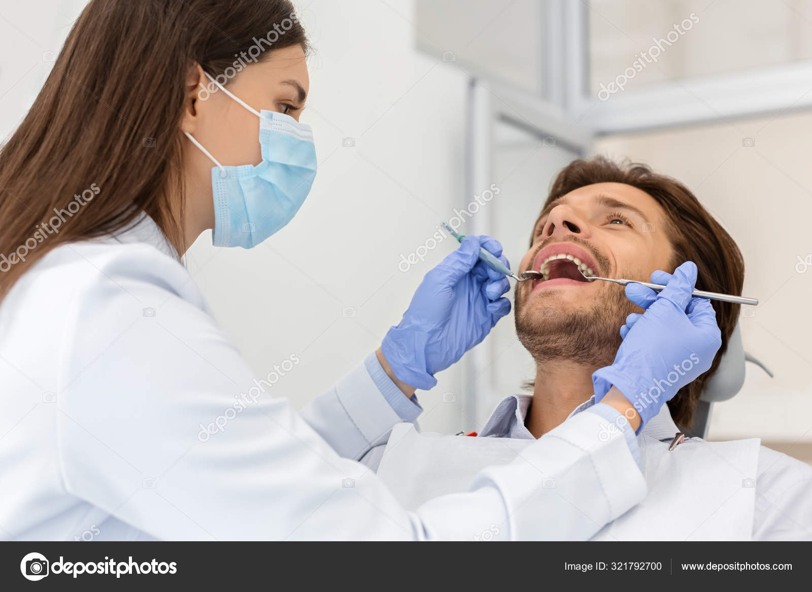 Man patient making check up in dental clinic — Stock Photo © Milkos ...