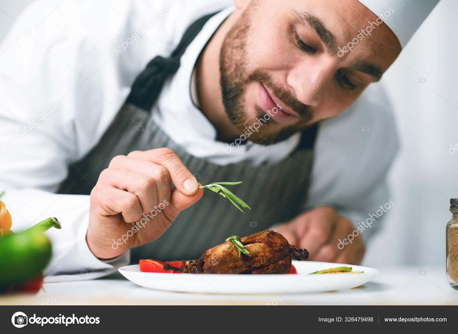 Chef Man In Uniform Decorating Dish In Restaurant Kitchen Stock Photo ...