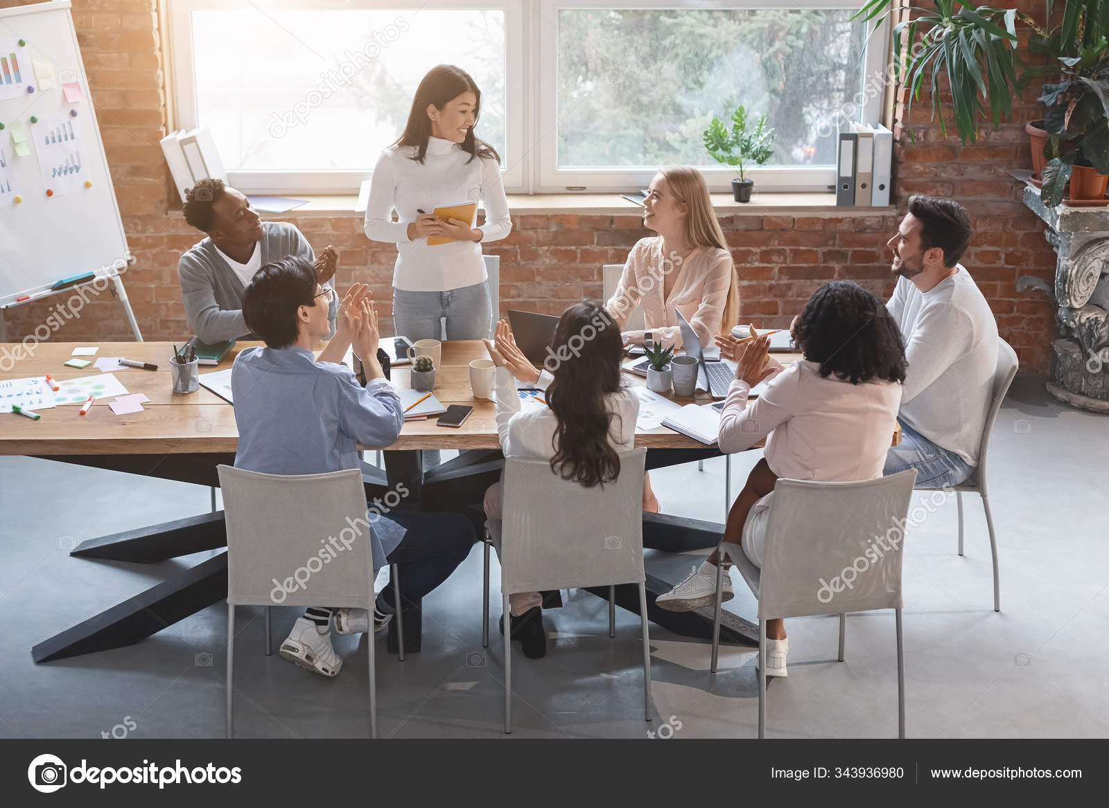 Asian lady making report in front of business team Stock Photo by ...