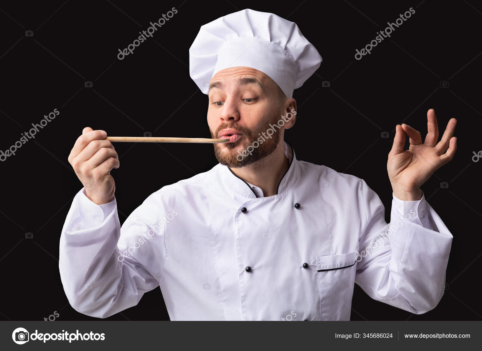 Cook Man Tasting Dish Over Black Studio Background — Stock Photo ...