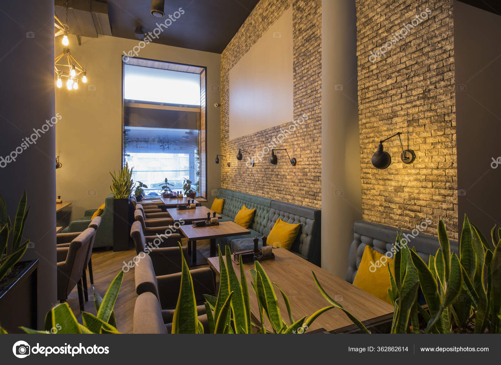 Modern restaurant in the loft style, large sofas Stock Photo by ©Milkos ...