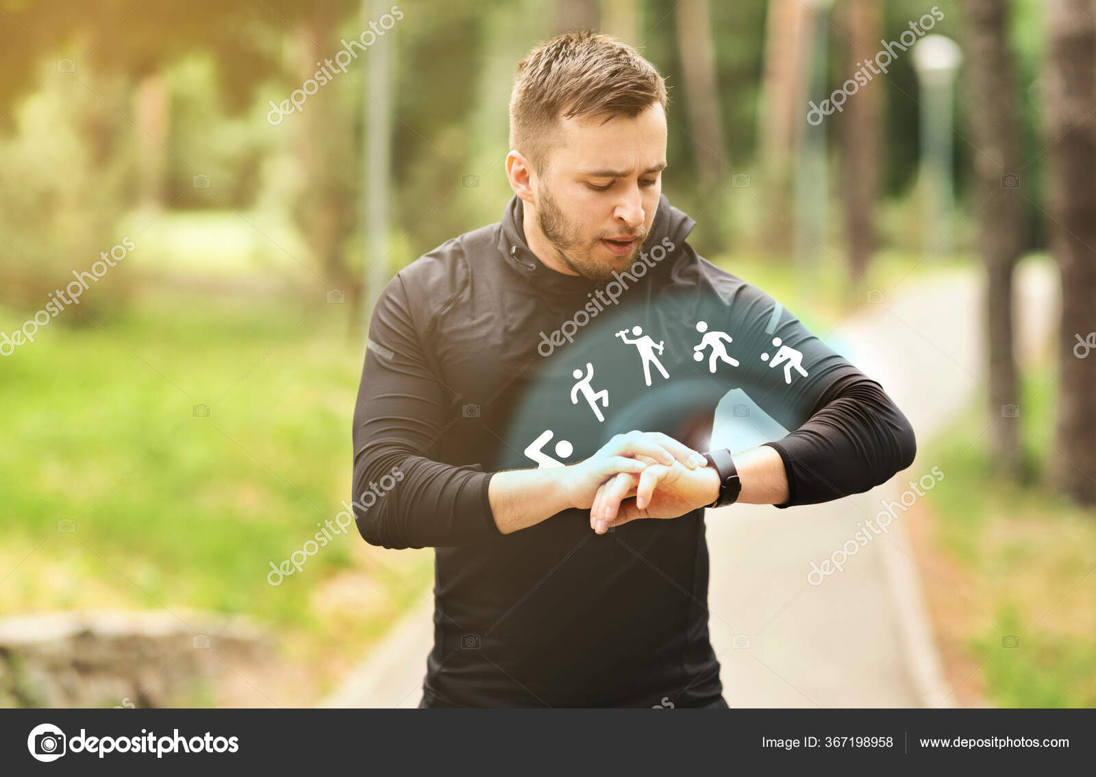 Professional runner using smartwatch to track his training process ...