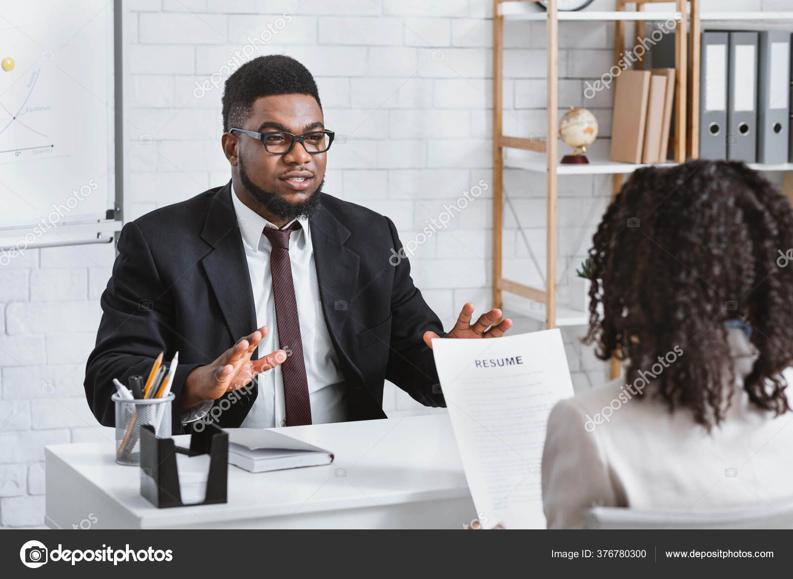 Millennial applicant answering HR managers questions during job ...