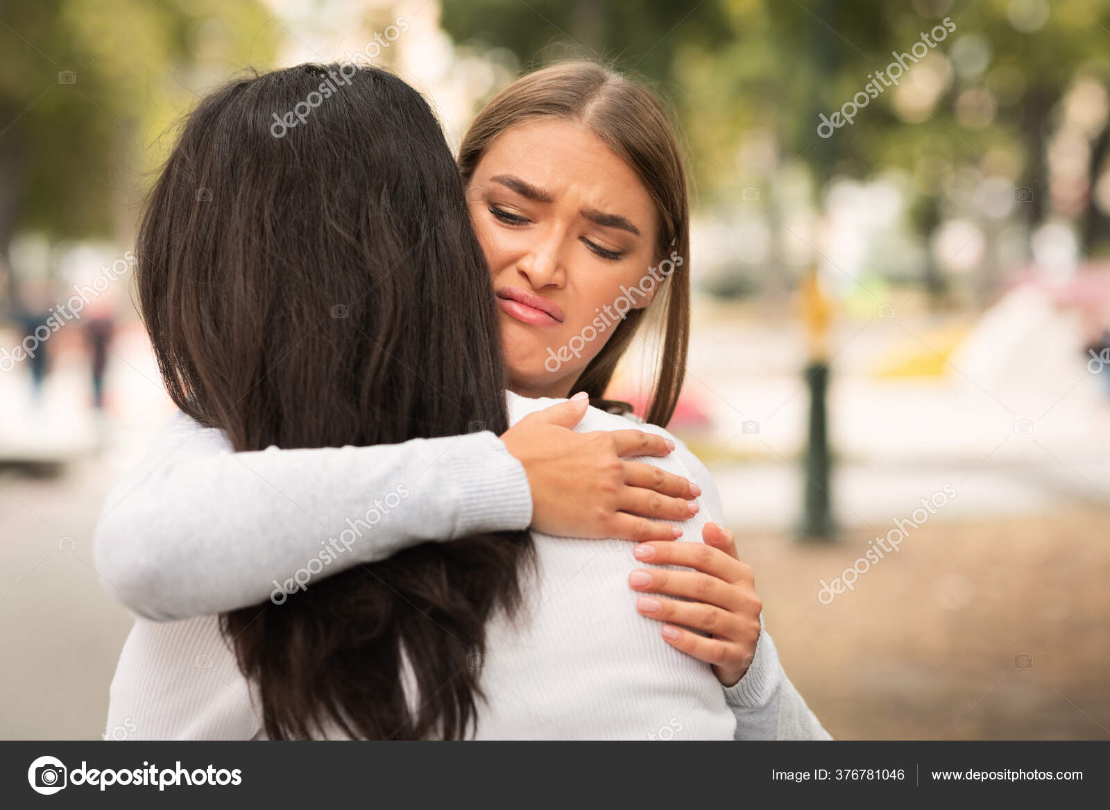 Friends Crying And Hugging