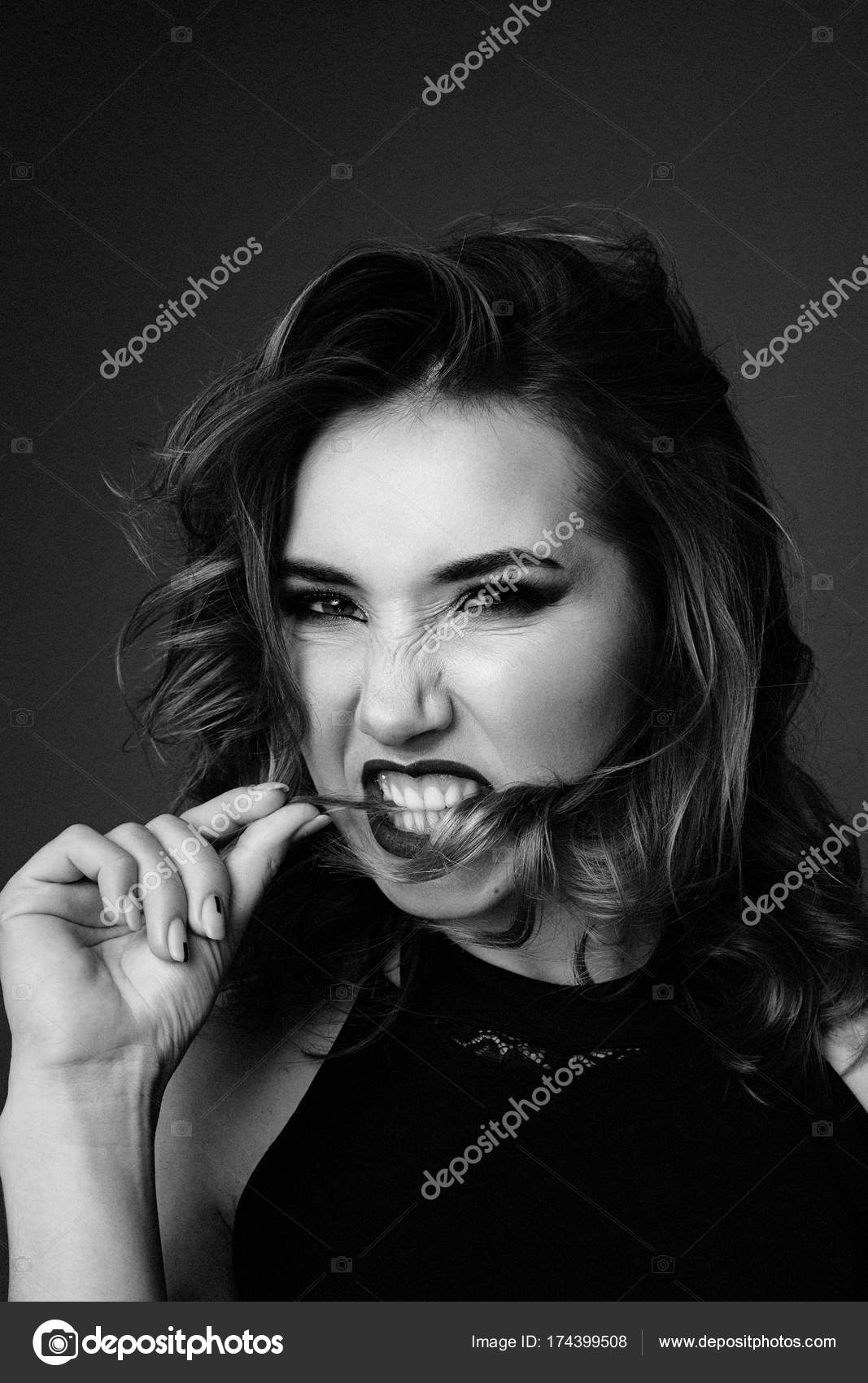 Angry gorgeous woman Stock Photo by ©smmartynenko 174399508