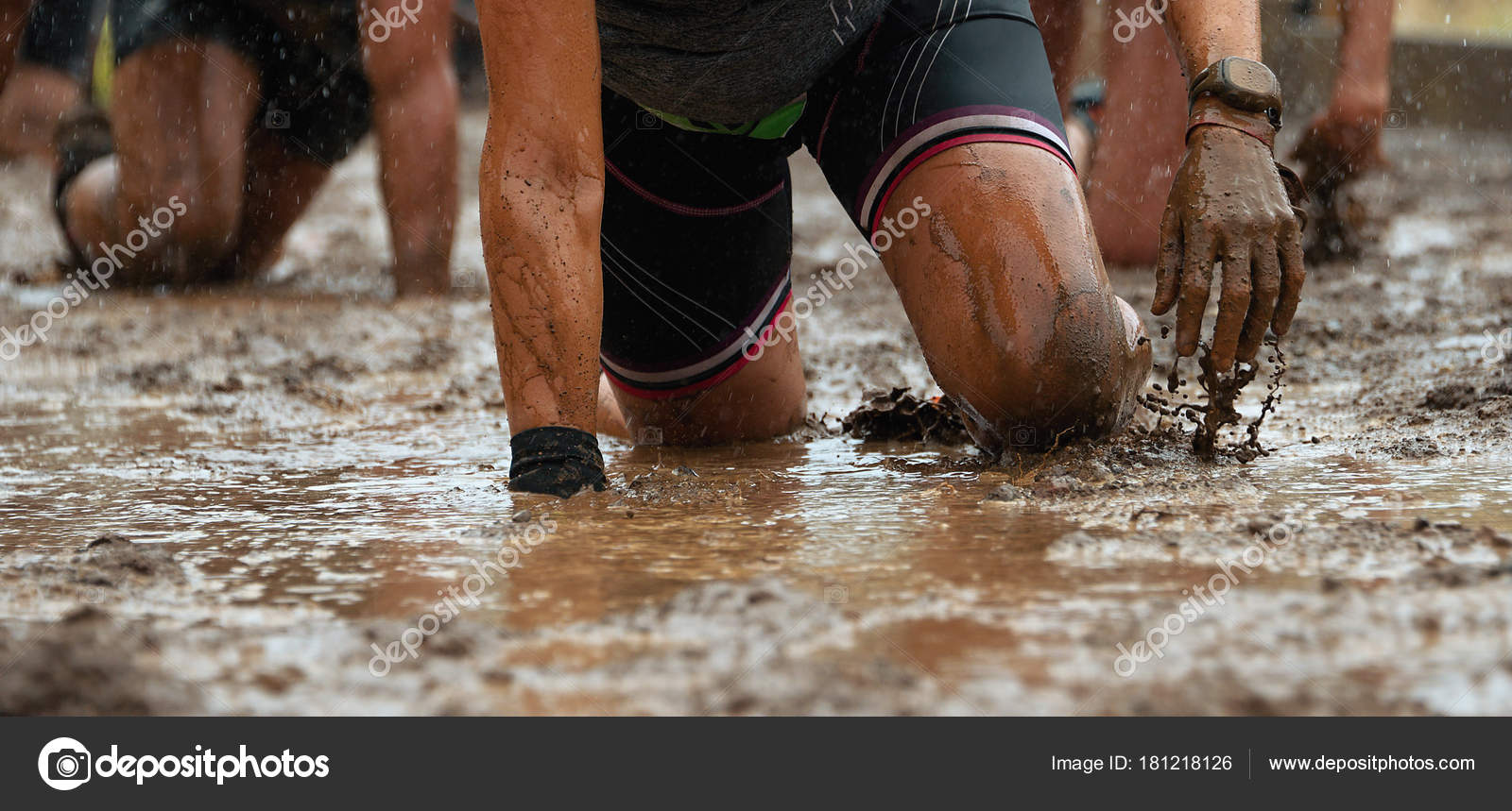 Mud Race Runners Crawling Passing Barbed Wire Obstacles Extreme ...