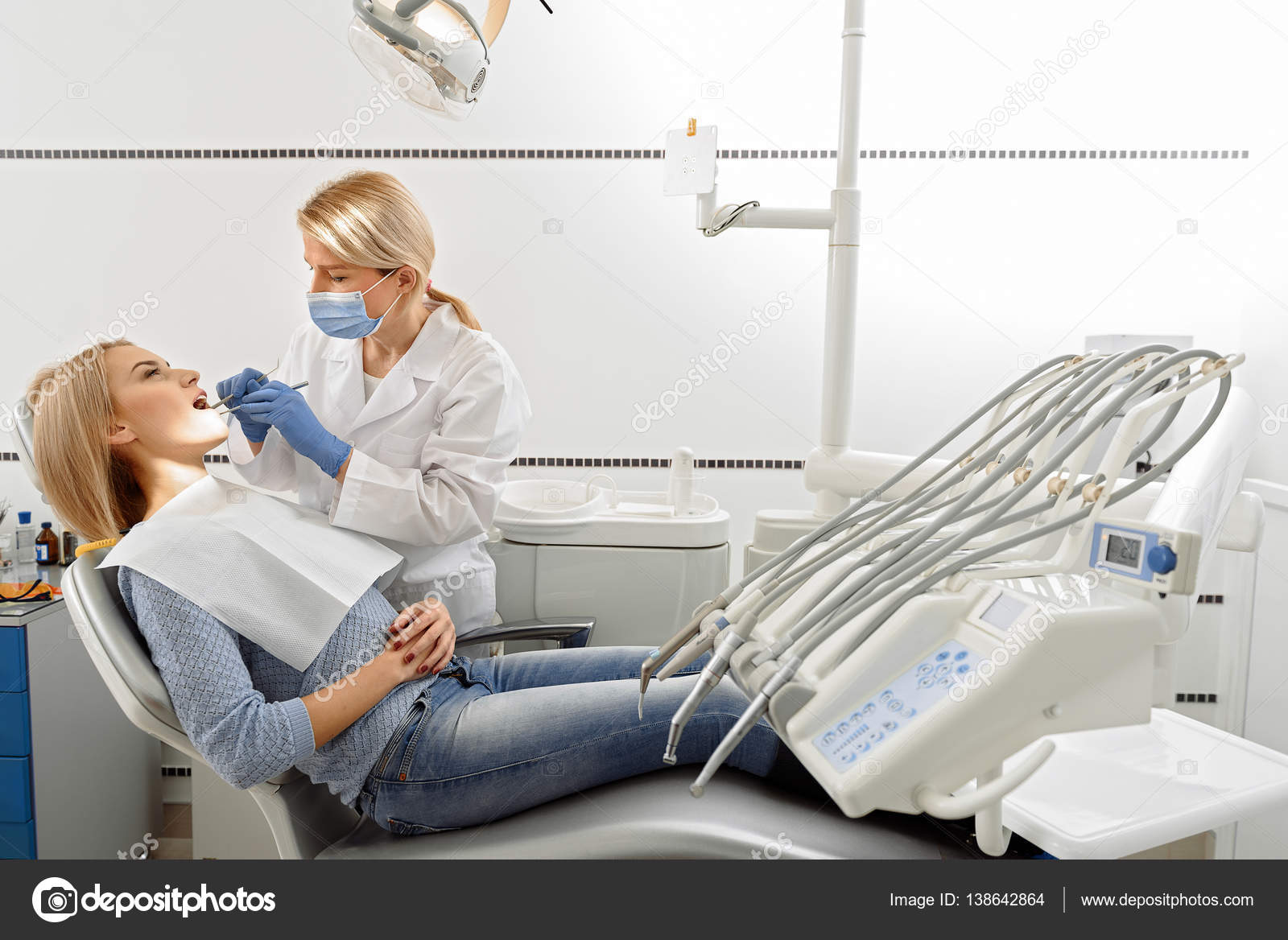Dentist operating tools in oral cavity of patient — Stock Photo ...
