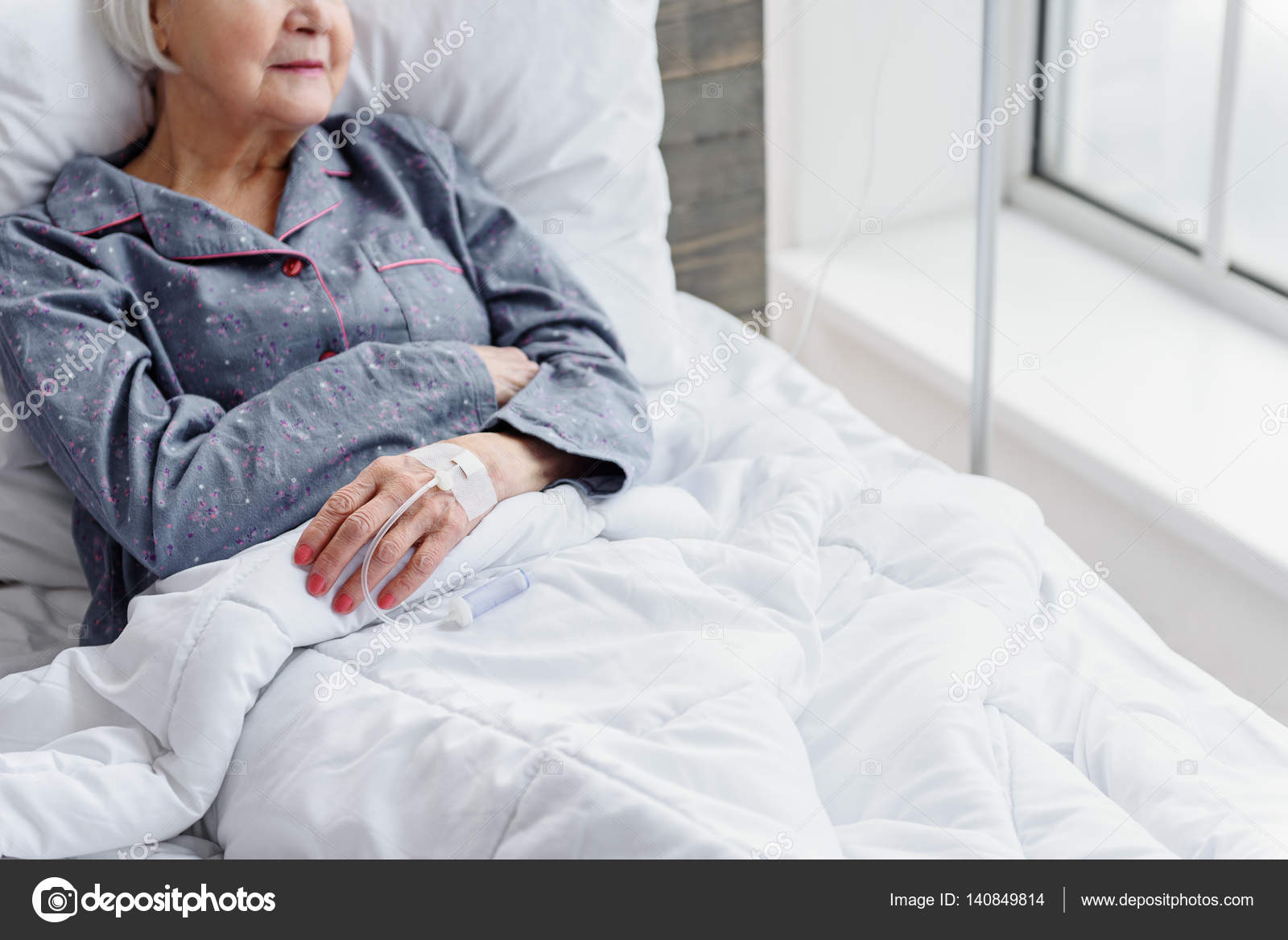 Old woman is on drip flask lying in bed Stock Photo by ©iakovenko123 ...