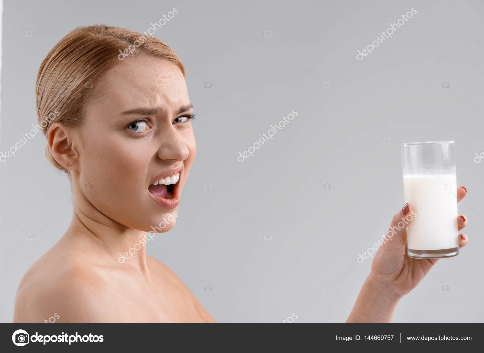 Girl refuses to drink white healthy beverage — Stock Photo ...
