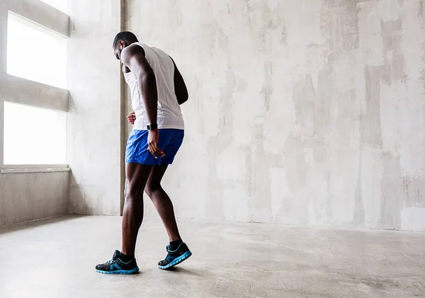 Athletic man making step ahead - Stock Image - Everypixel