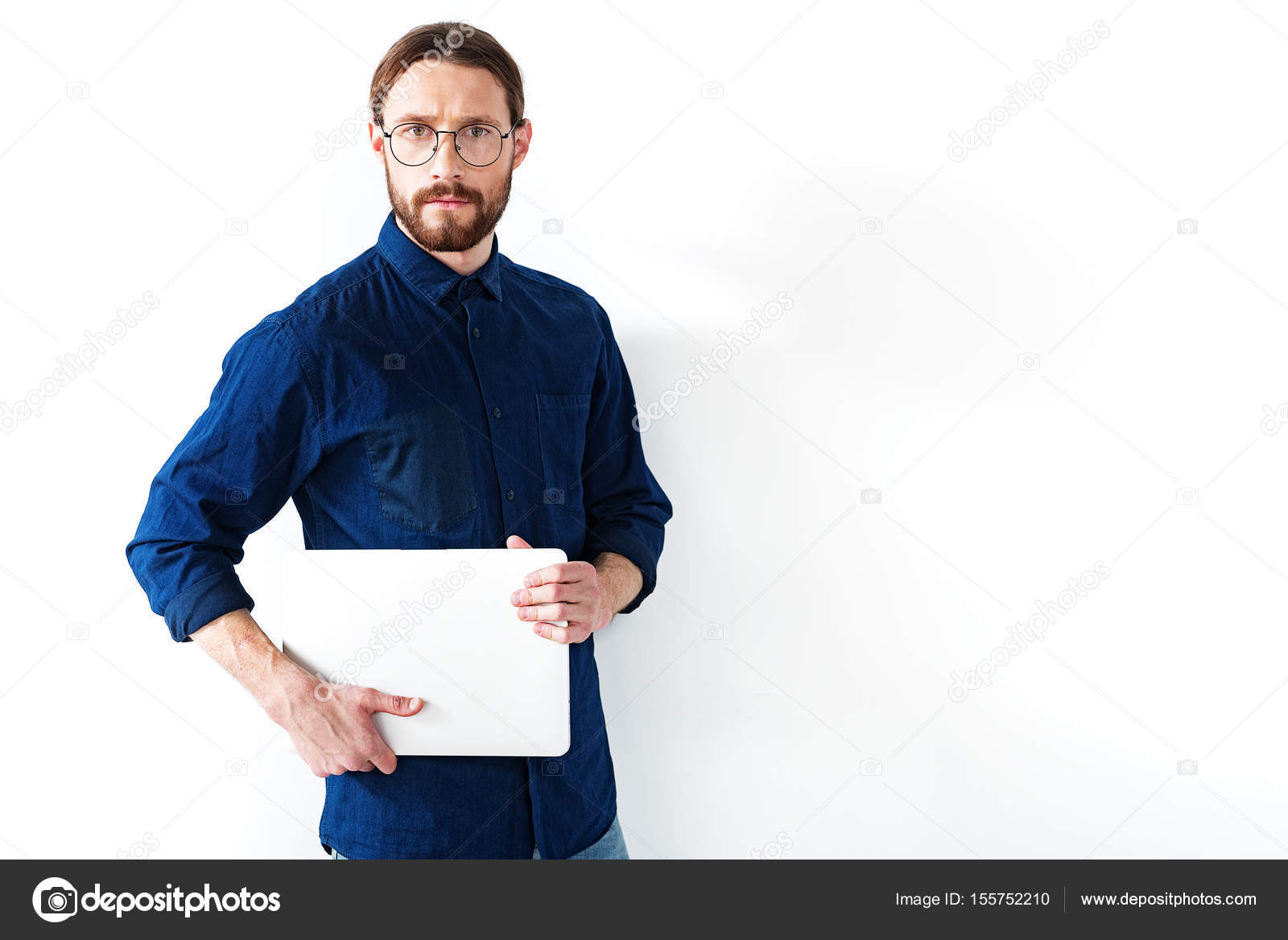 Smart guy posing with modern laptop — Stock Photo © iakovenko123 #155752210