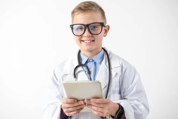Happy future doctor holding tab - Stock Image - Everypixel