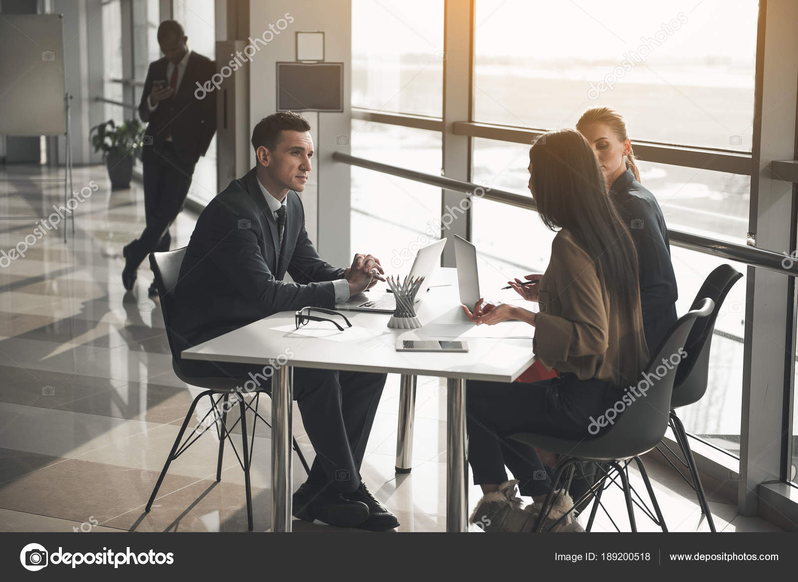 Young man interviewing new candidate for position — Stock Photo ...