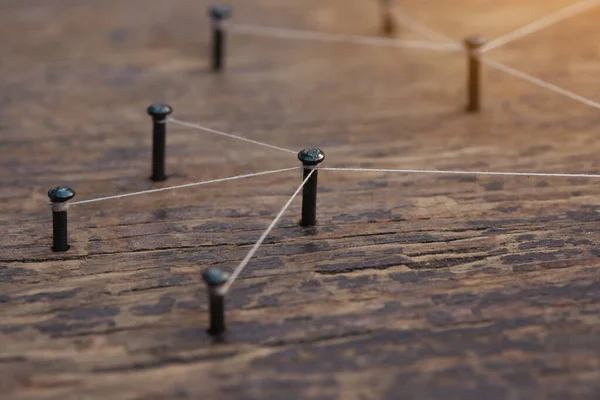 Connecting networks concept - network connected with yarn white on ...