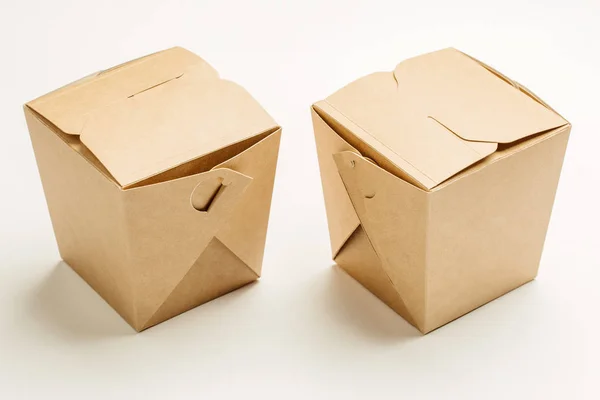 Four WOK paper boxes. Asian fast food concept. Stock Photo by ...