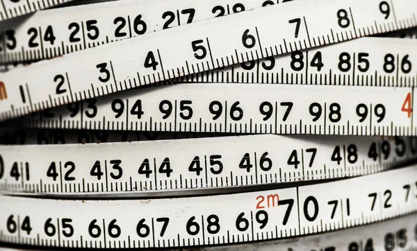 Background of wooden meter rulers Stock Photo by ©PHOTOLOGY1971 43571113