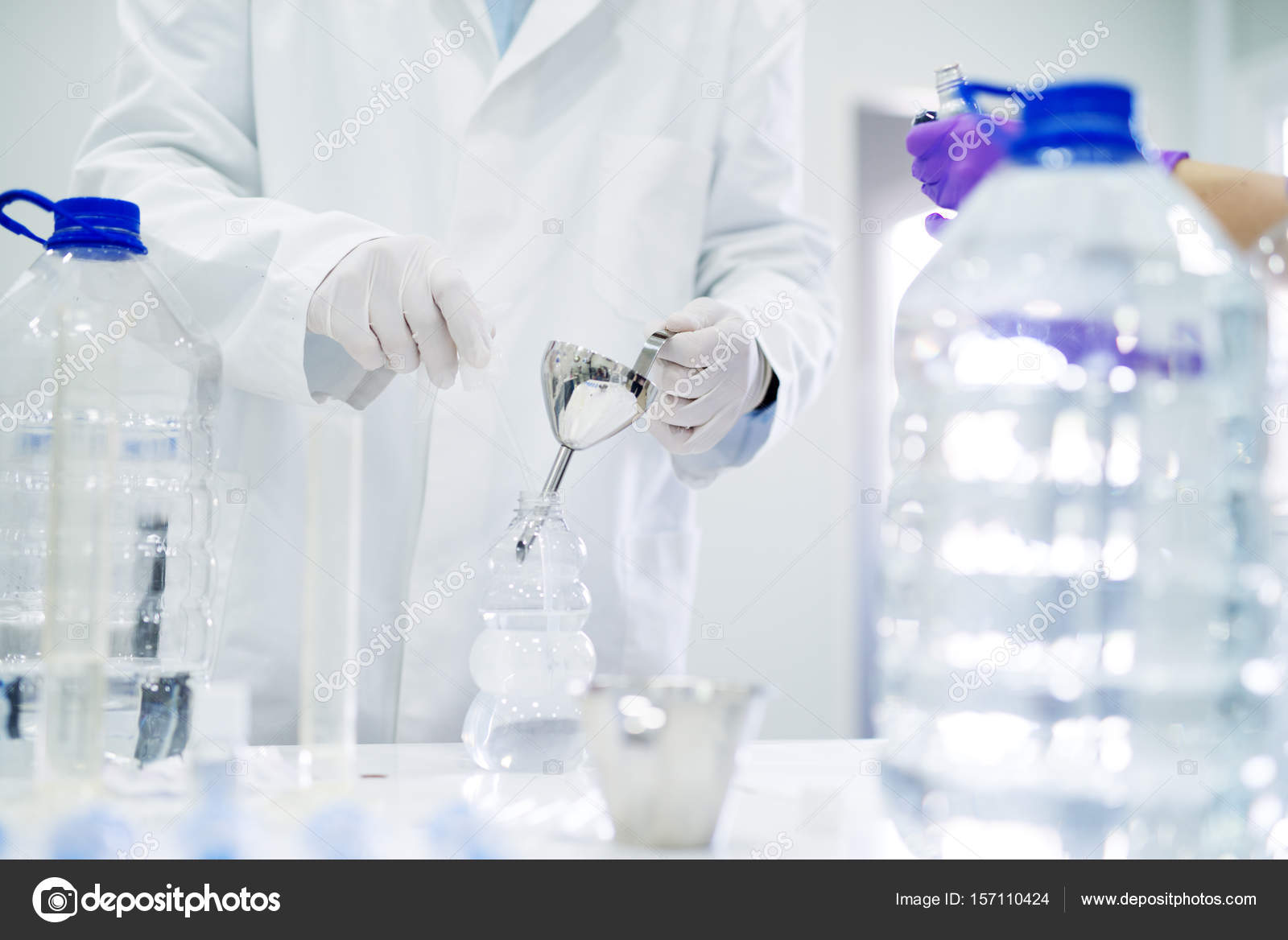 Lab technician doing chemical analysis Stock Photo by ©dusanpetkovic ...