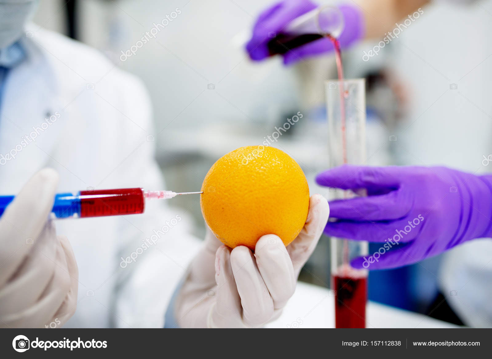 Injecting chemical substances into orange Stock Photo by ©dusanpetkovic ...