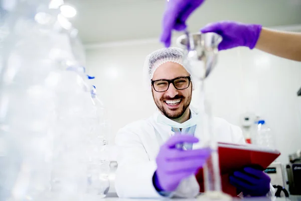 Lab Technicians Doing Chemical Analysis Testing Chemical Composition ...