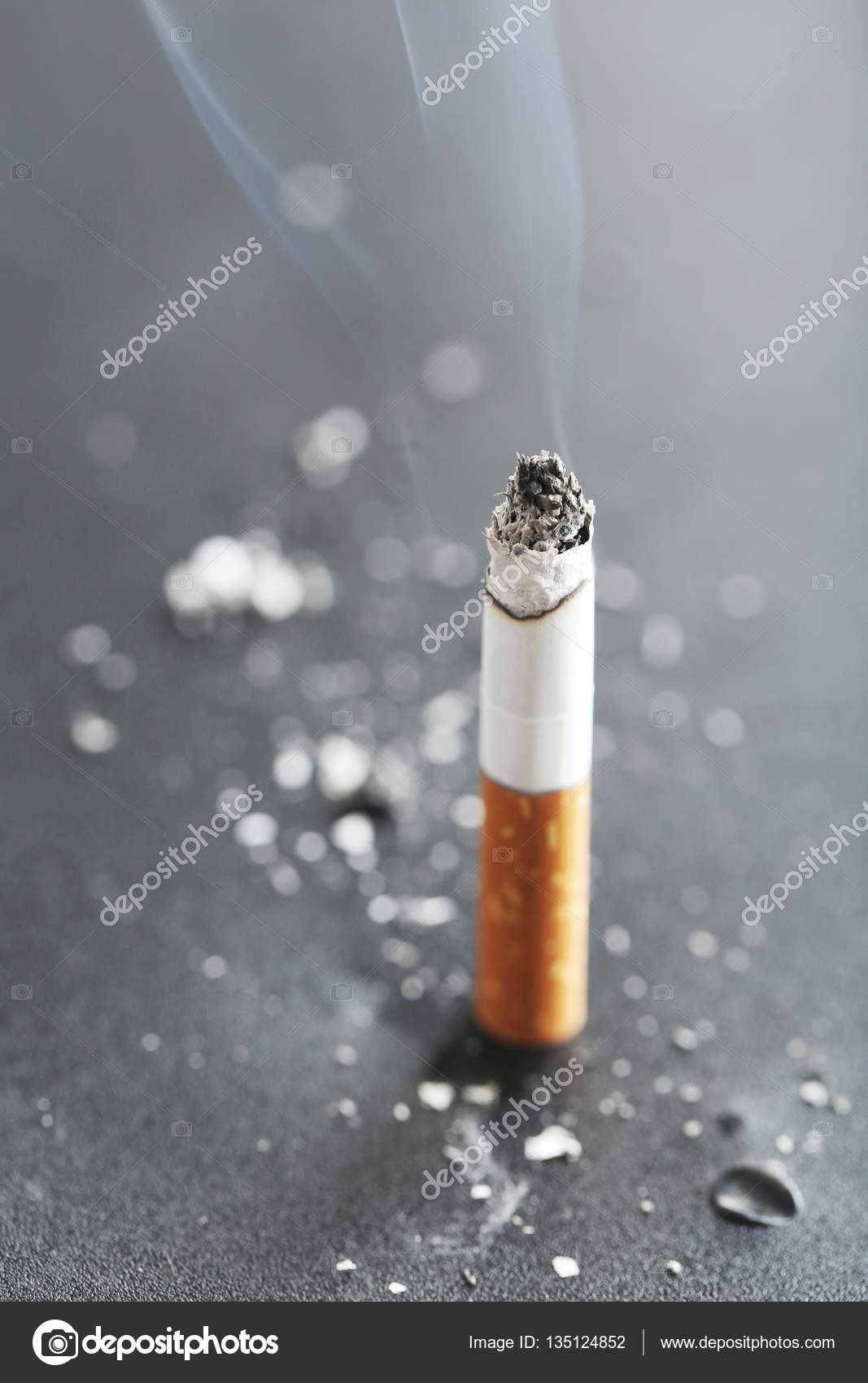 Cigarette with ash and smoke Stock Photo by ©5seconds 135124852