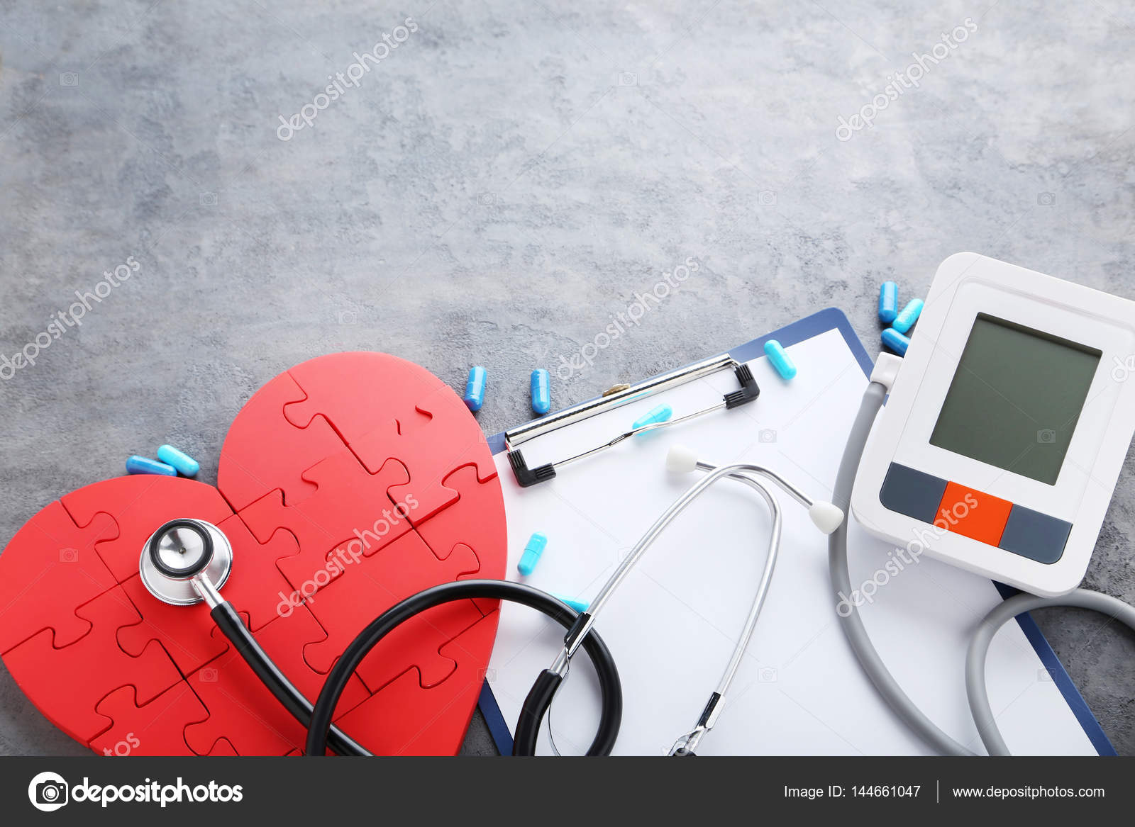 White electric tonometer with stethoscope — Stock Photo © 5seconds ...