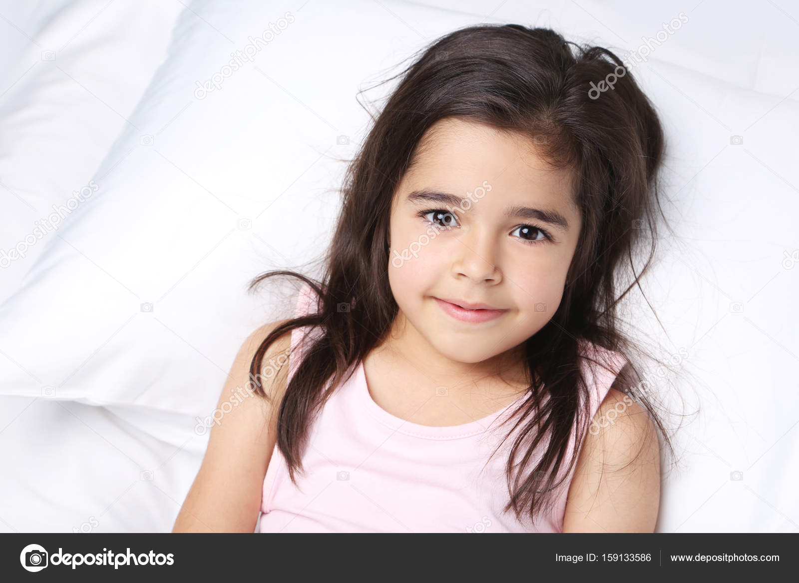 Beautiful little girl sleeping in bed Stock Photo by ©5seconds 159133586