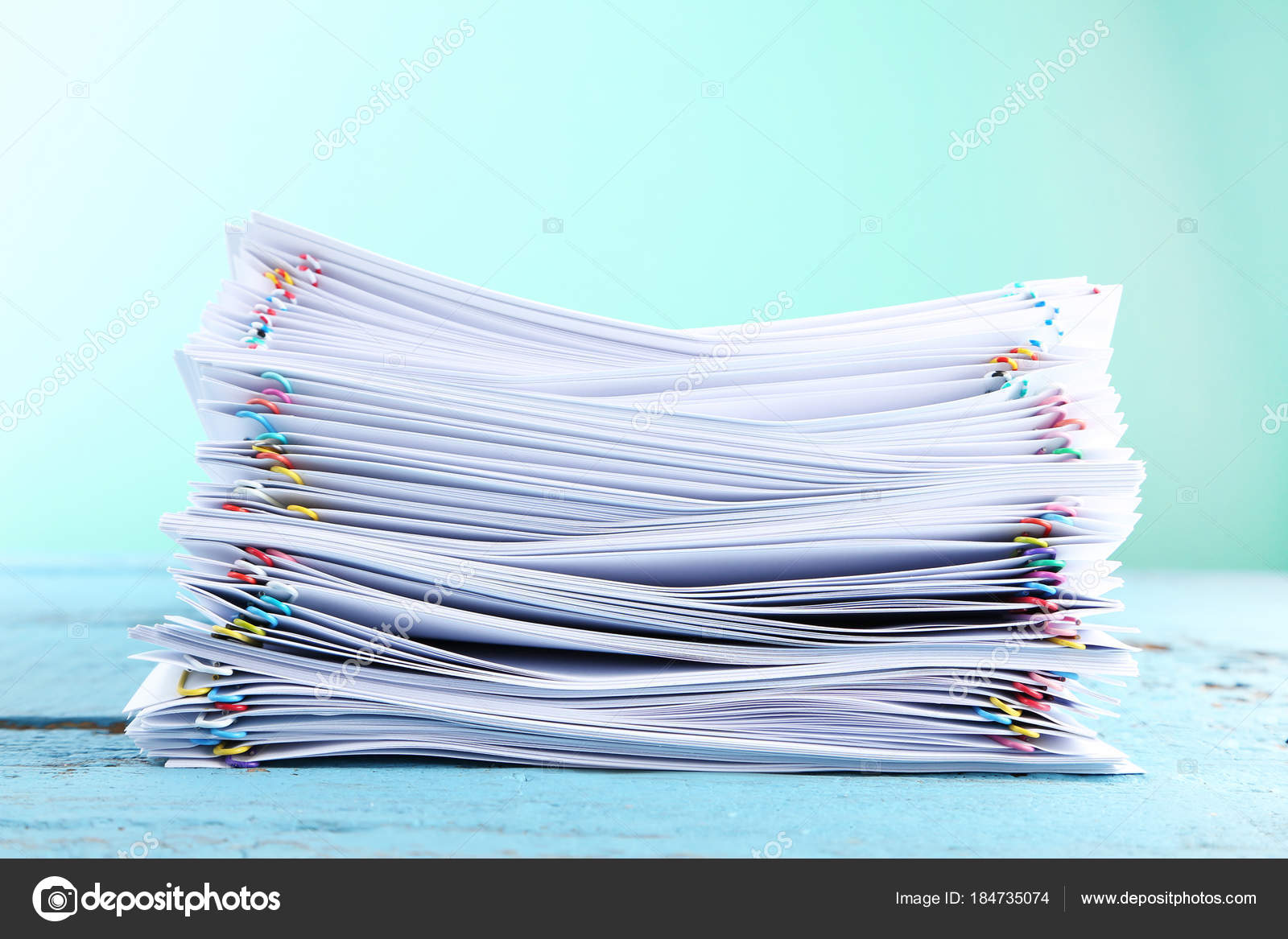 Stack Papers Paperclips Blue Wooden Table Stock Photo by ©5seconds ...