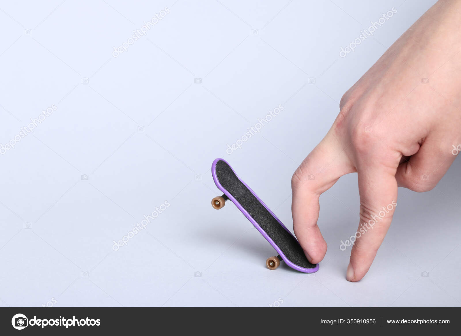Fingerboard Hand Fingers Grey Background Stock Photo by ©5seconds 350910956