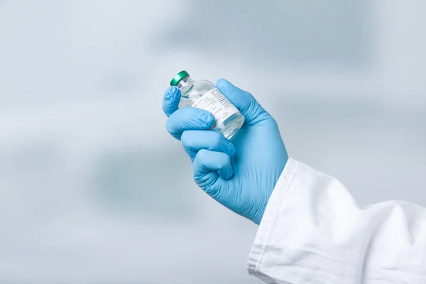 Hand with serum Stock Photo by ©StudioLaMagica 161892958