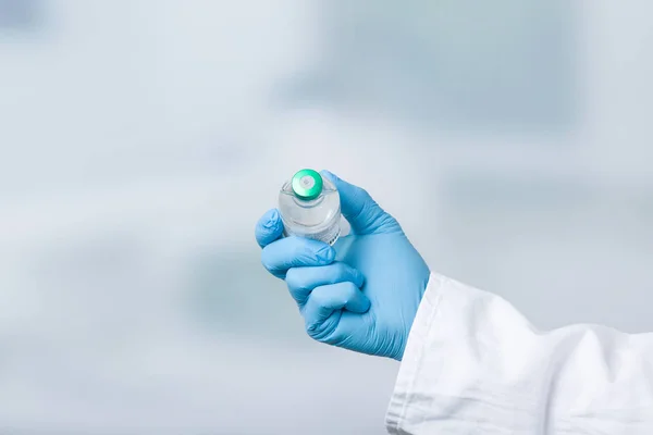 Hand with serum Stock Photo by ©StudioLaMagica 161892958