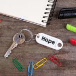 Old key with hope sign — Stock Photo © orlaimagen #58411079