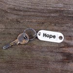 Old key with hope sign — Stock Photo © orlaimagen #58411079