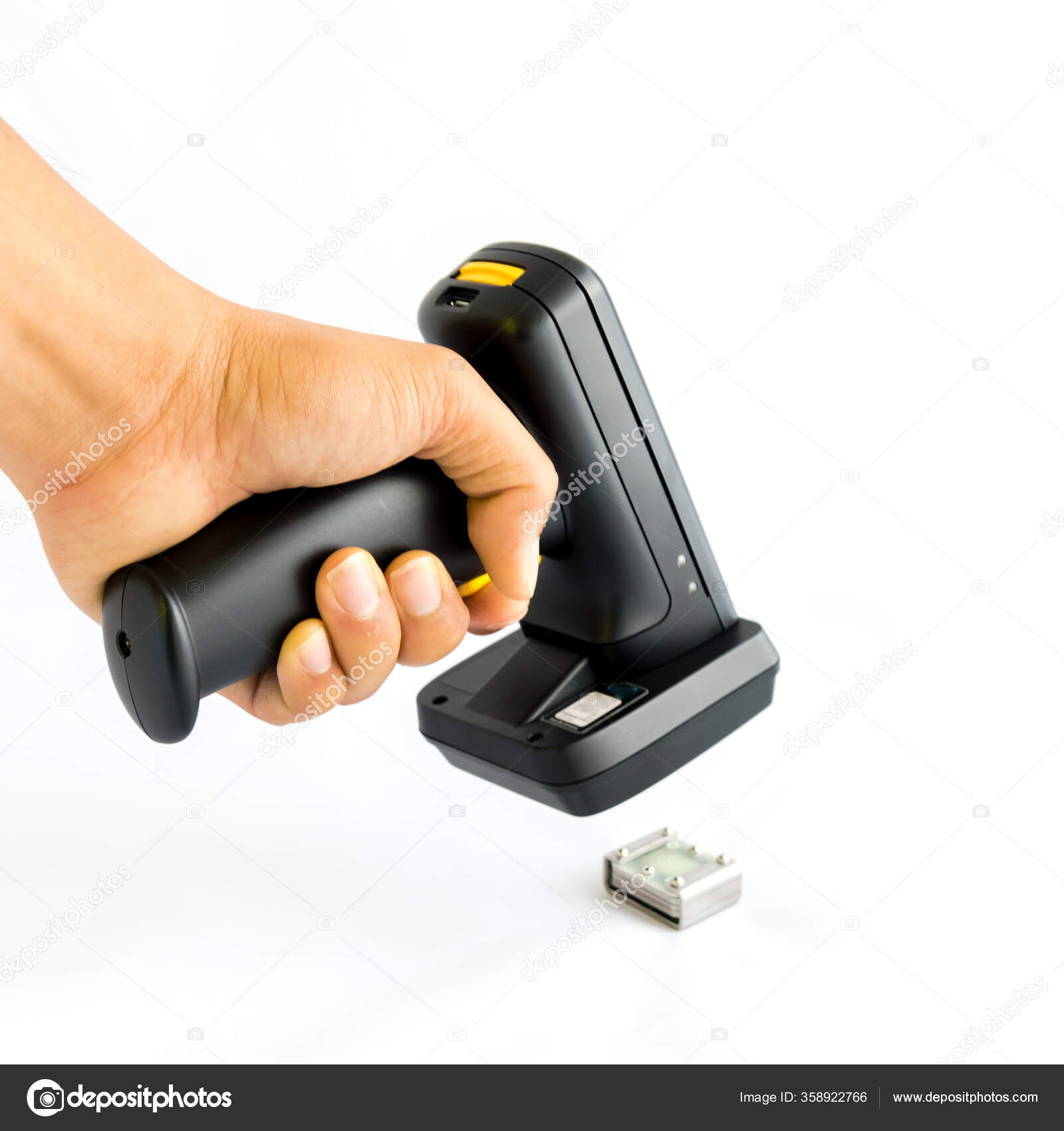 Male hand using barcode reader to scan metal RFID tag isolated on white ...