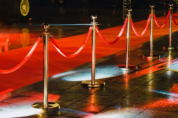 Portable Barrier for Queue Control. Red security rope by red carpet ...