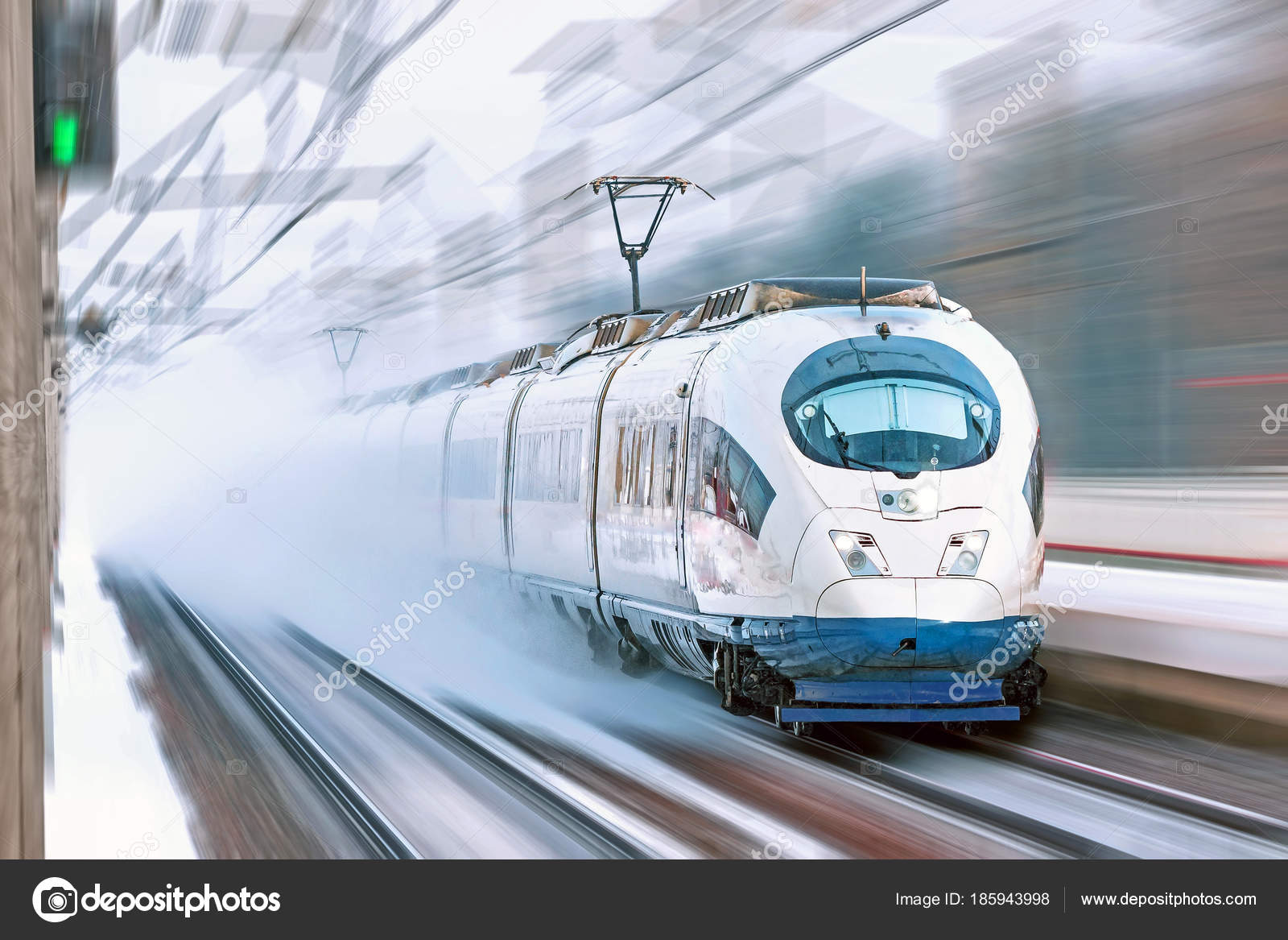 High speed train rides at high speed at the railway station in the city ...