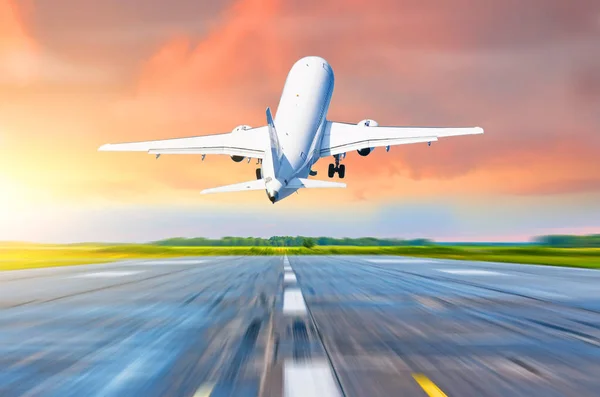 Takeoff plane in airport at sunset — Stock Photo © arquiplay77 #8197776