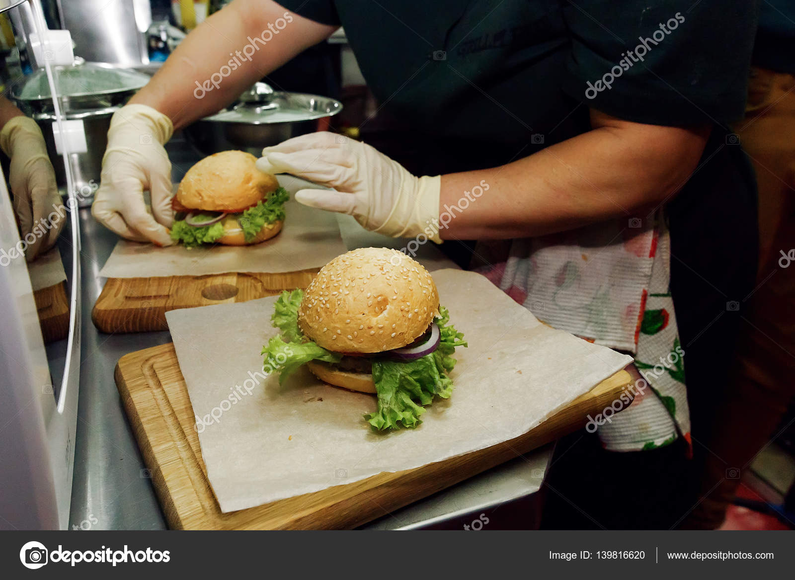 Process of making burger. — Stock Photo © Sonyachny #139816620