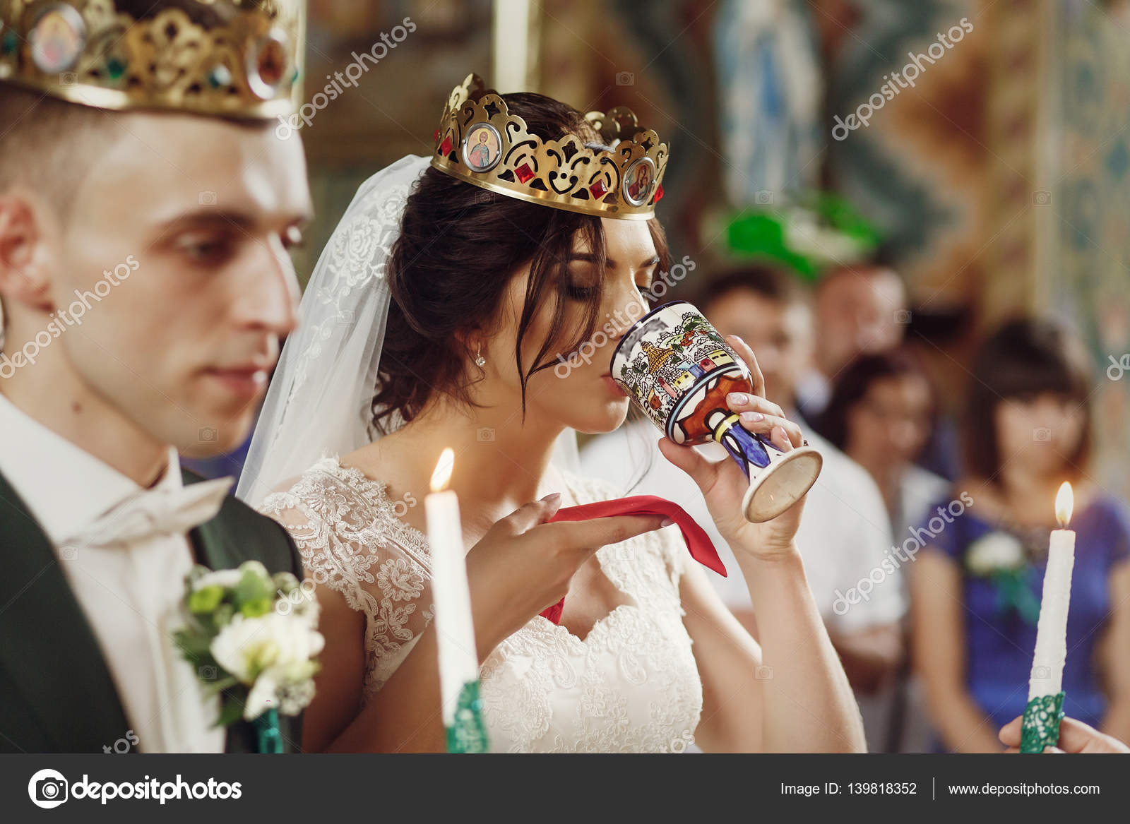 Beautiful couple taking communion — Stock Photo © Sonyachny #139818352