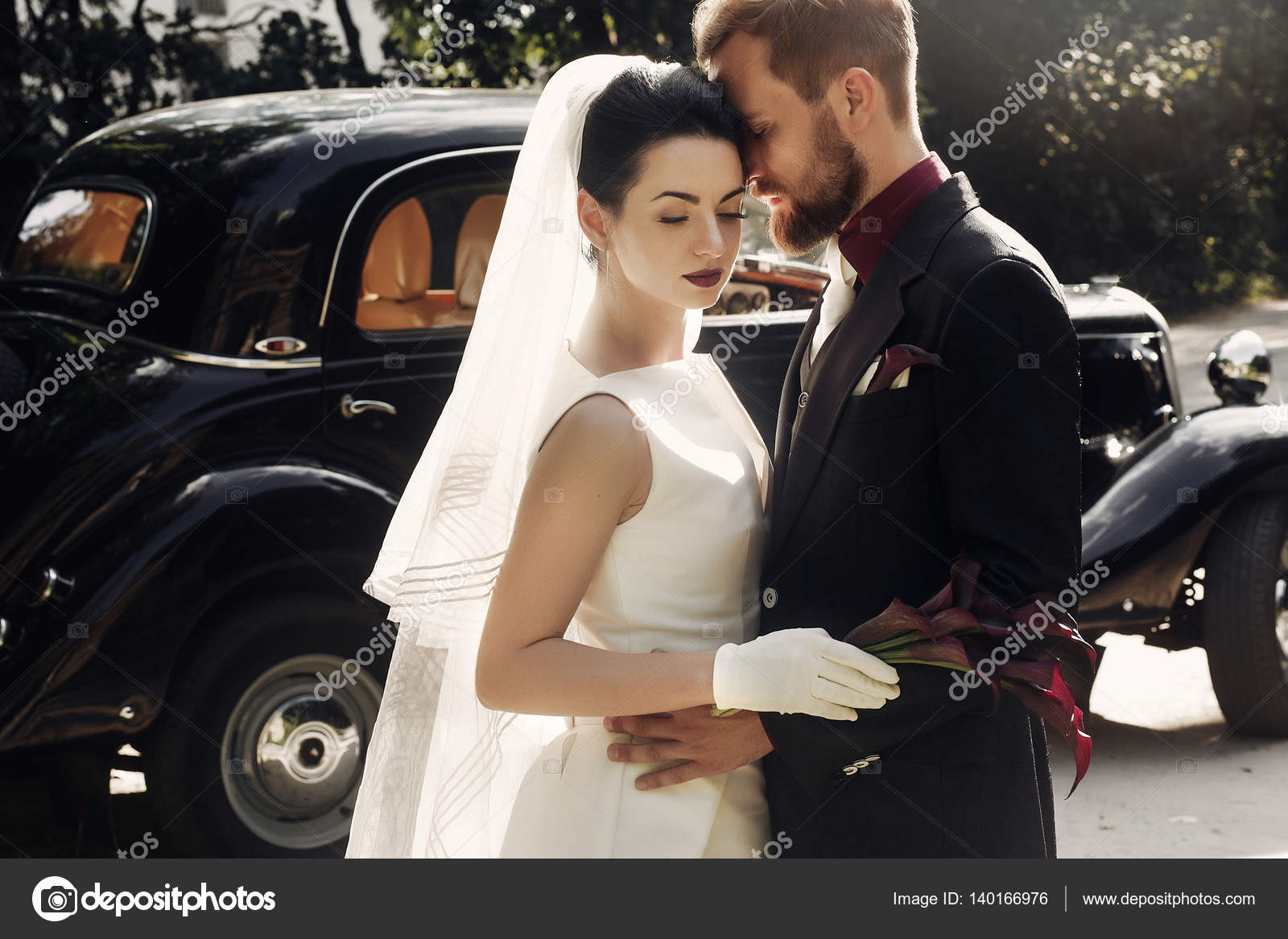 Bride and handsome stylish groom Stock Photo by ©Sonyachny 140166976