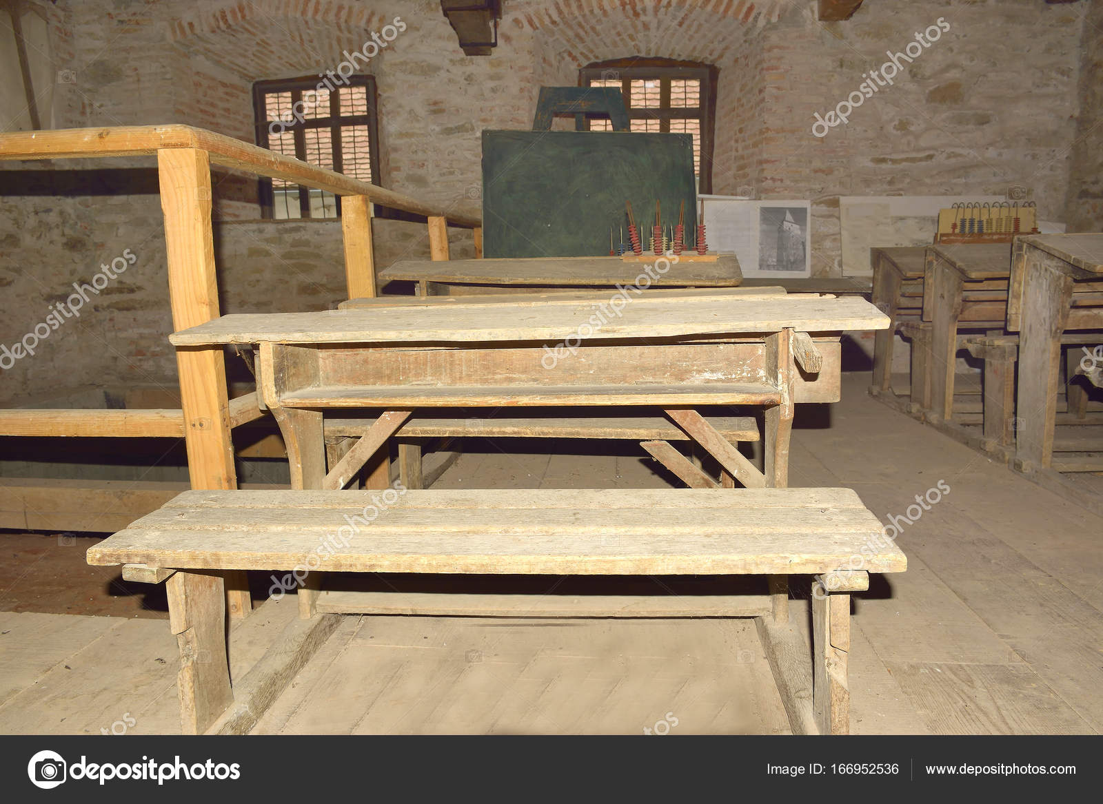 Vintage classroom desks inside a one room country school house. Looking ...
