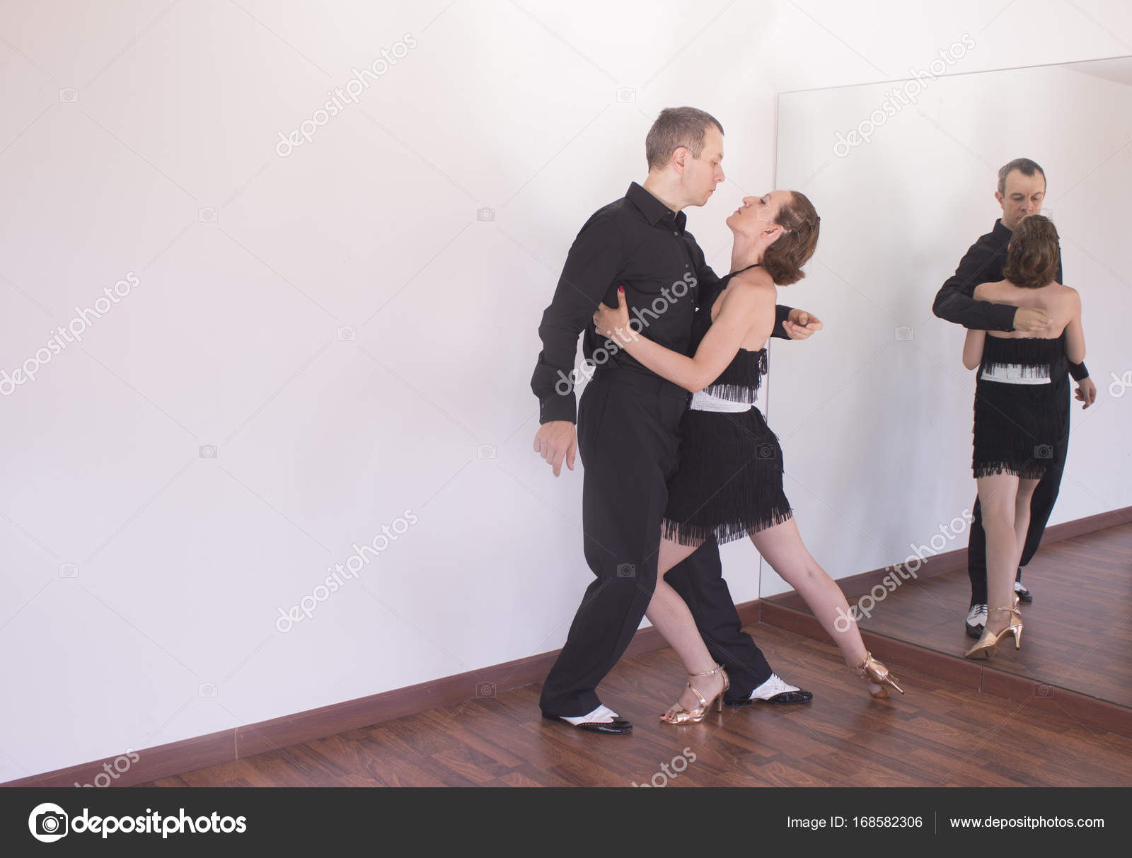 Couple of dancers dancing latin dances — Stock Photo © GemaIbarra #168582306